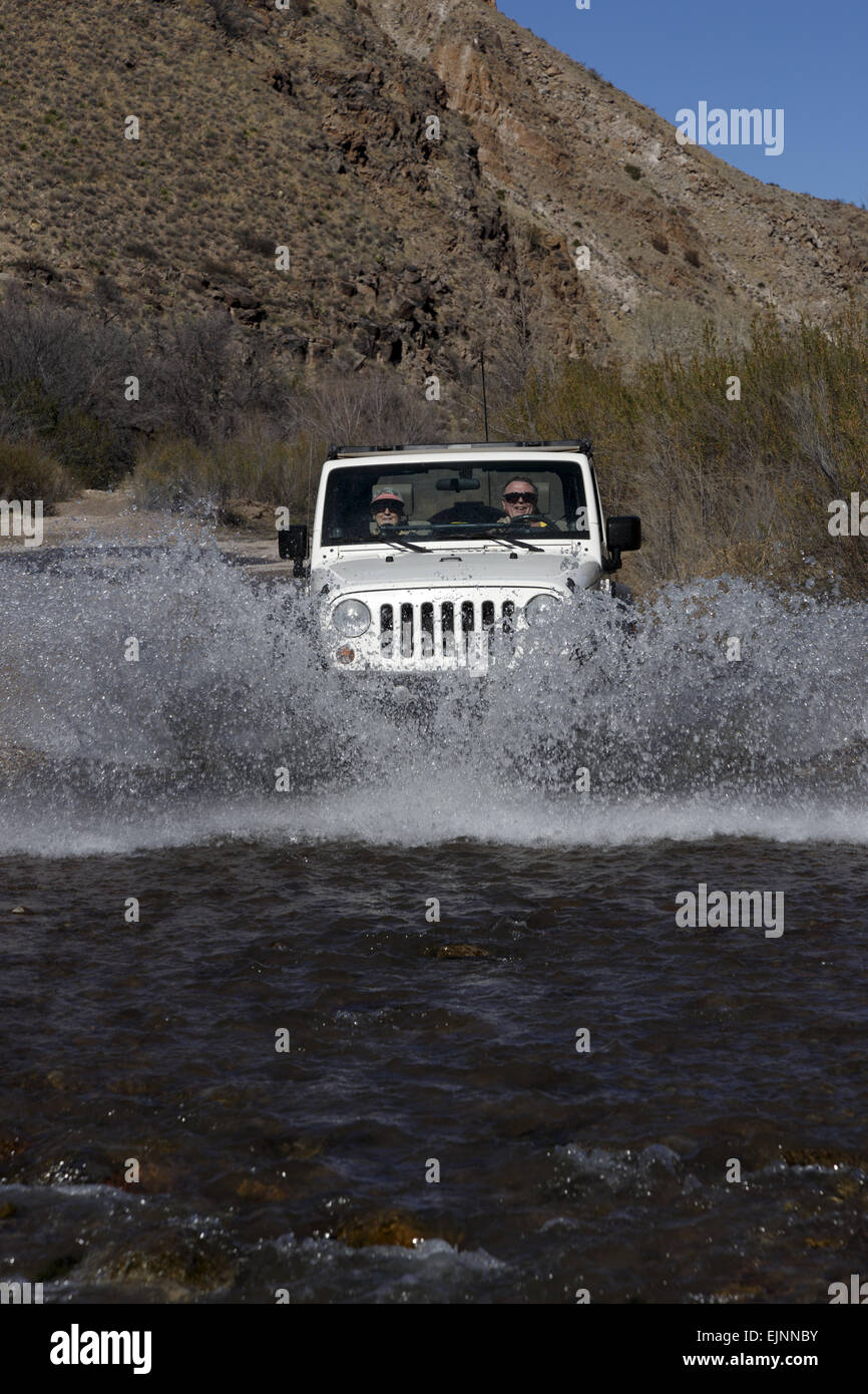 Jeep creating spray driving water in through Monticello Box Canyon New ...