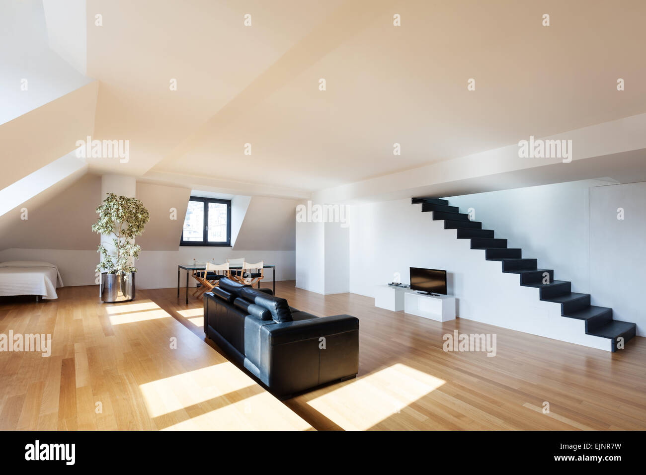 Interior, wide loft, hardwood floor, view living room Stock Photo - Alamy