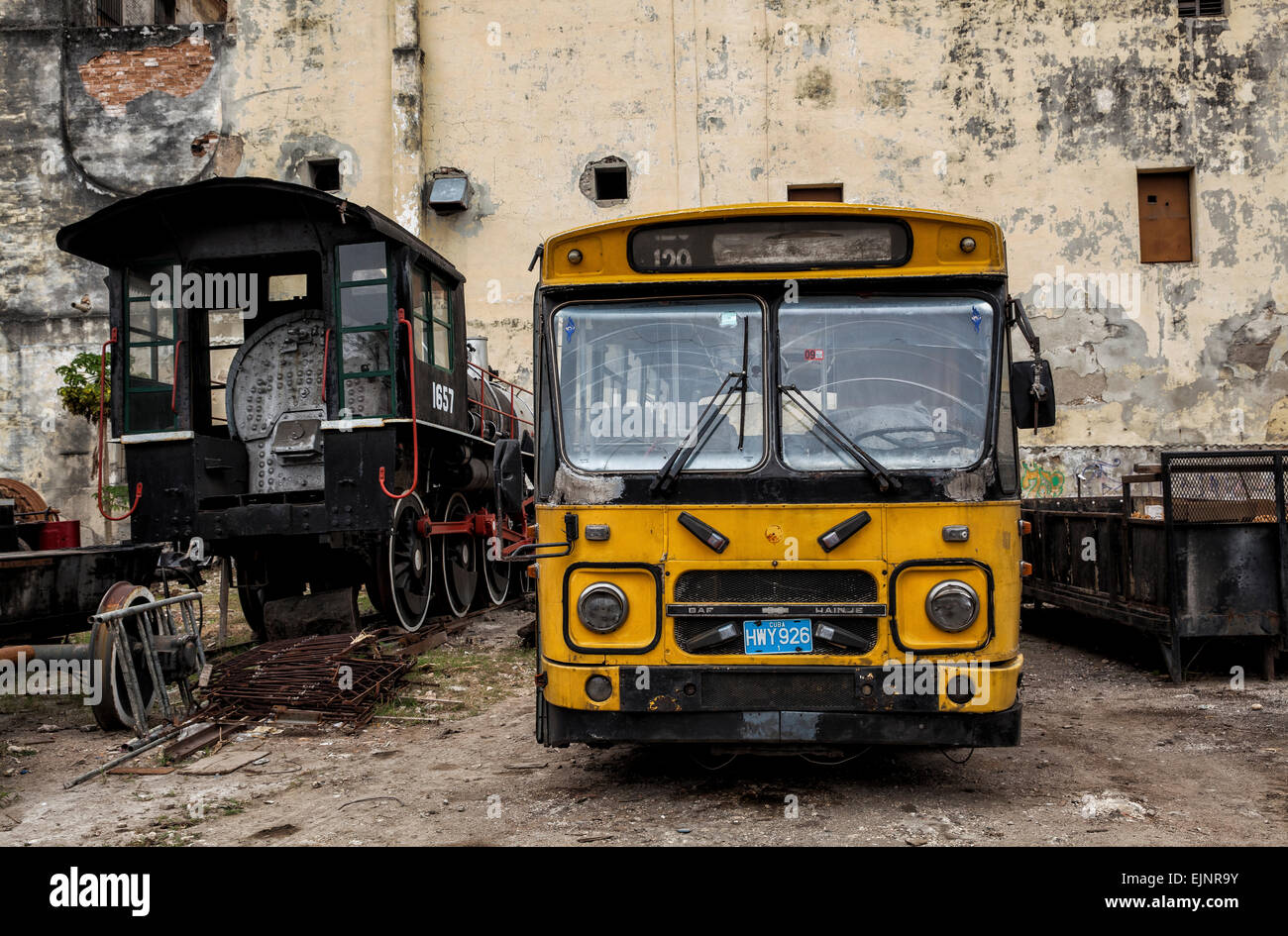 Old American Yellow School bus and an American steam engine being ...