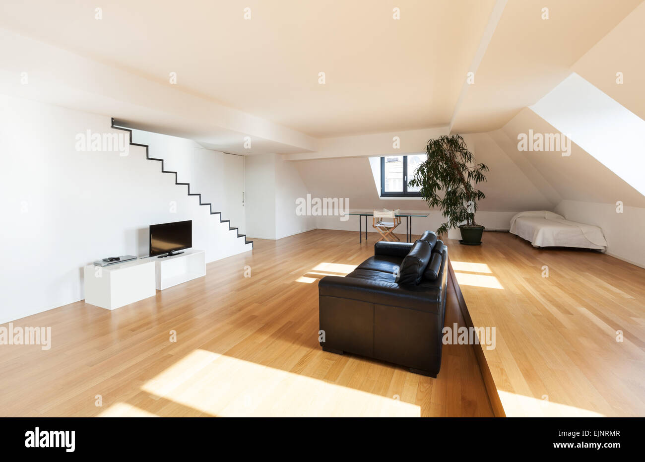 Interior, wide loft, hardwood floor, view living room Stock Photo - Alamy