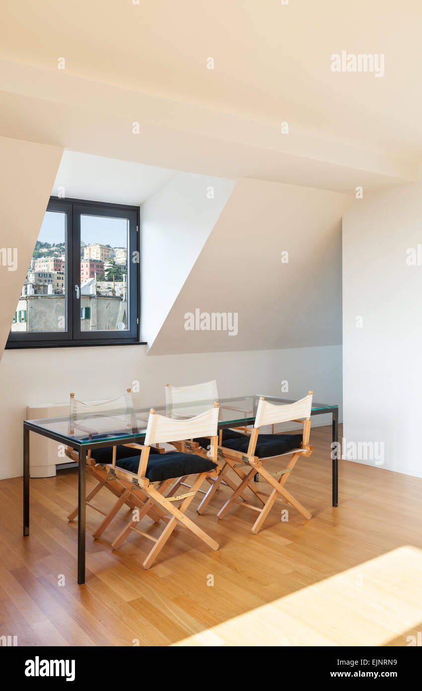 Interior, beautiful loft, hardwood floor, glass dining table Stock ...