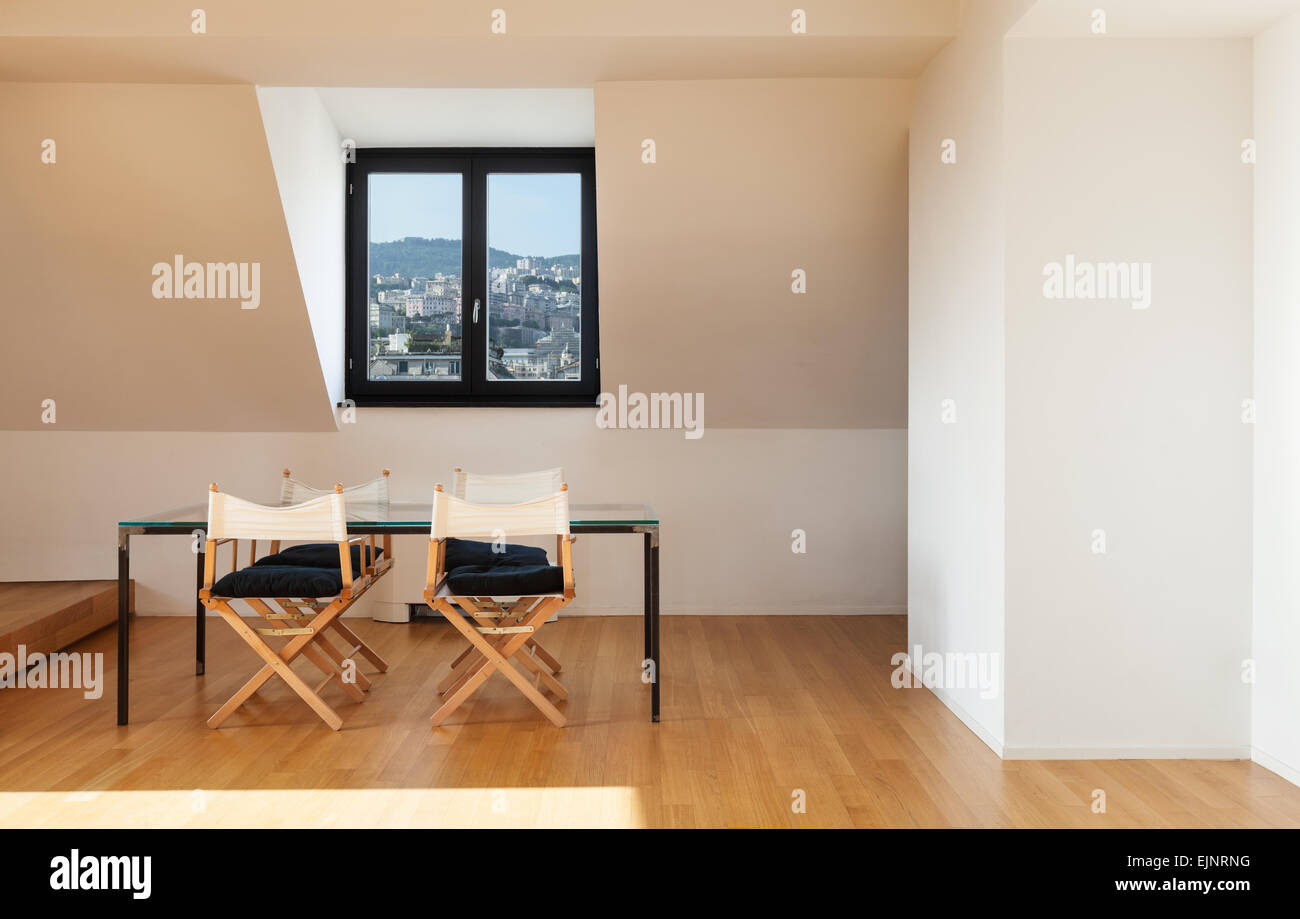 Interior, wide loft, hardwood floor, view dining table Stock Photo - Alamy