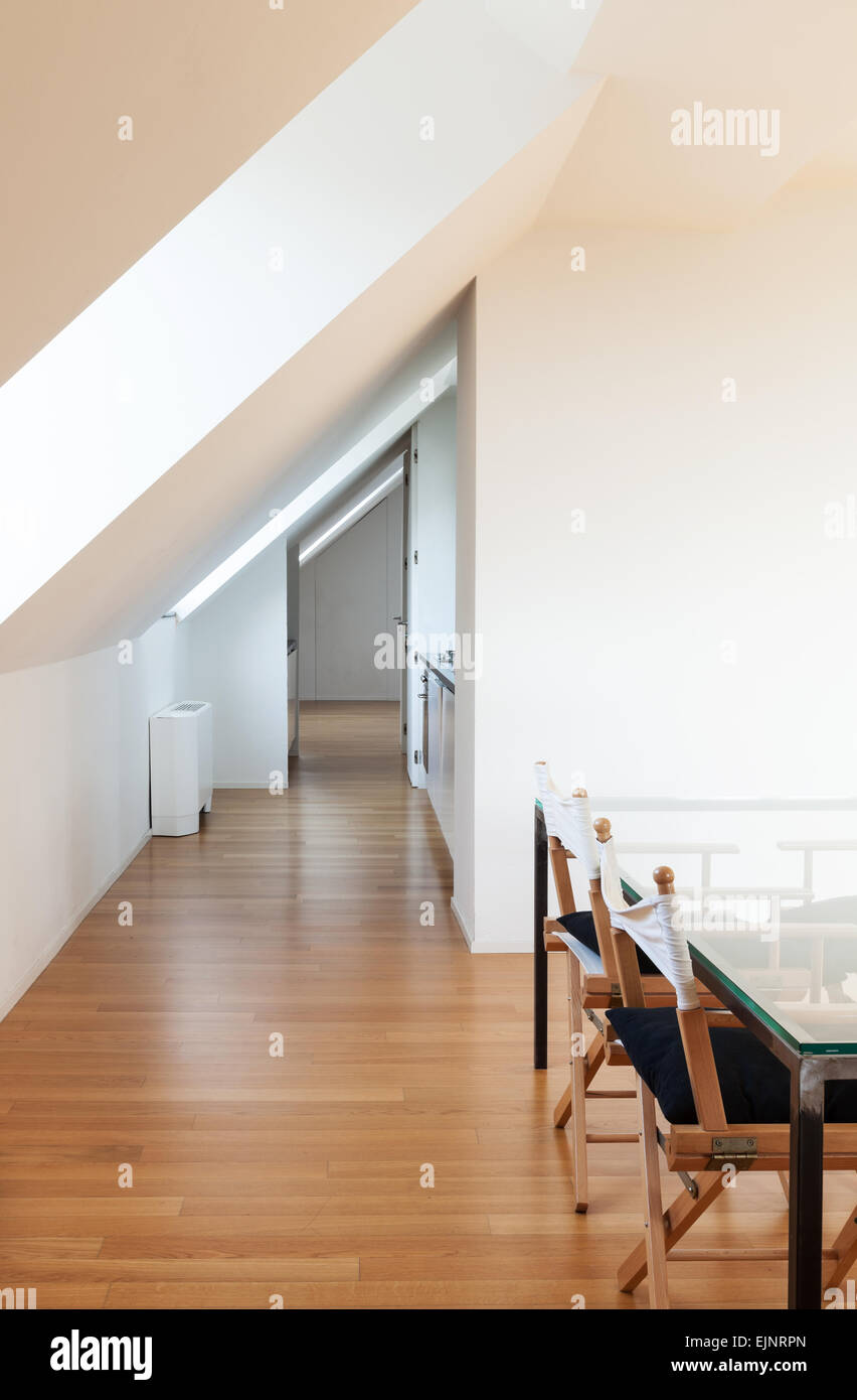 Interior, beautiful loft, hardwood floor, dining table Stock Photo - Alamy