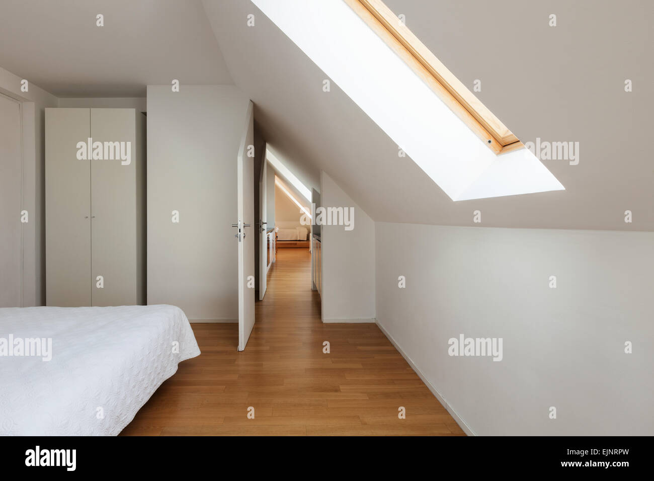 interior, new loft, hardwood floor, view of bedroom Stock Photo - Alamy
