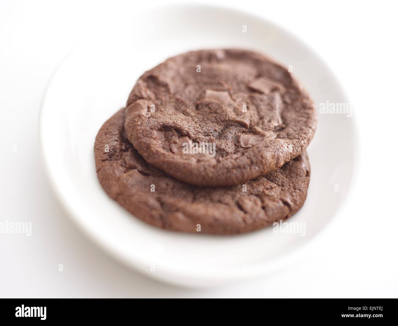 two choc chip cookies Stock Photo - Alamy