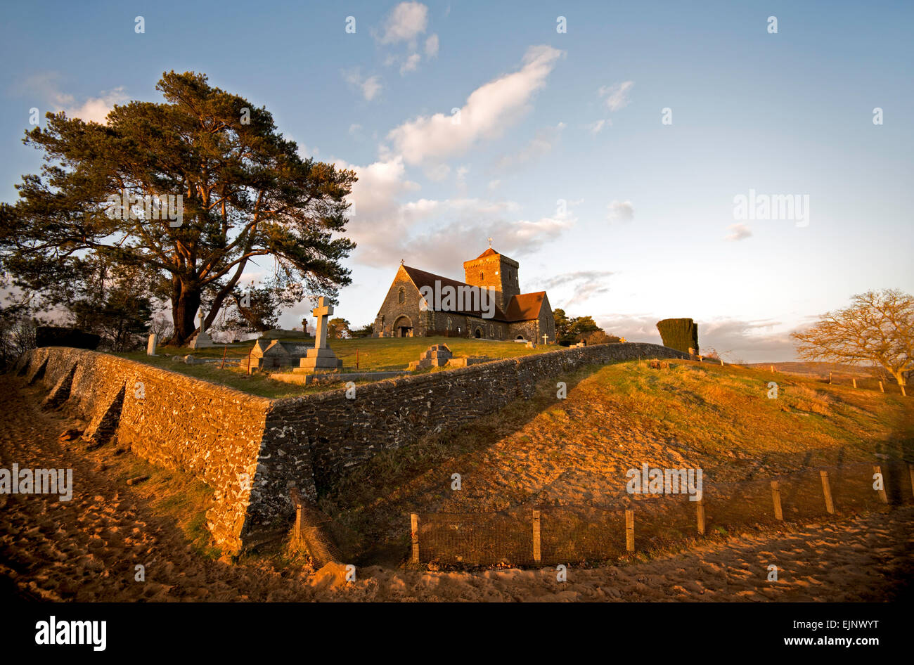 Small country church at sunset Stock Photo - Alamy