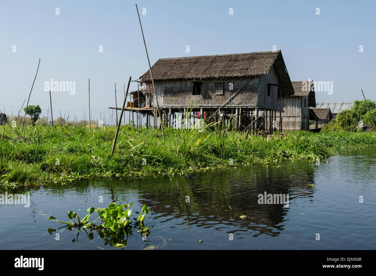Scene from Inle Lake, stilt houses Stock Photo - Alamy