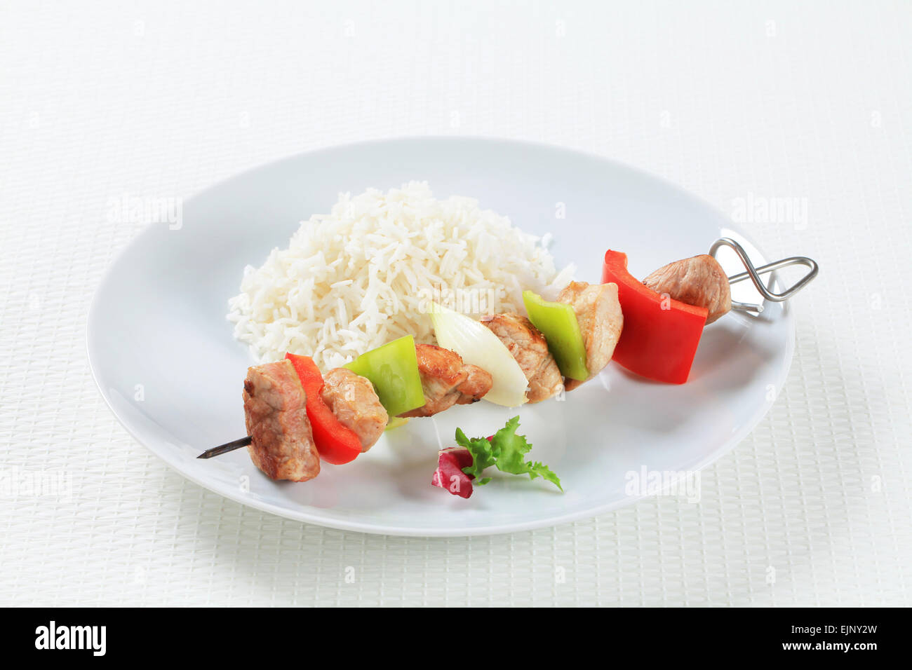 Shish kebab with white rice Stock Photo - Alamy