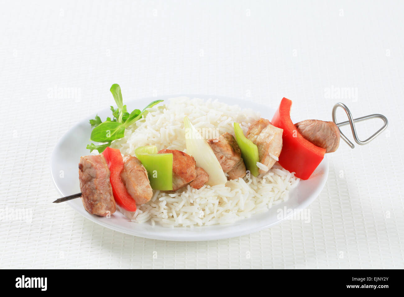 Shish kebab with white rice Stock Photo - Alamy