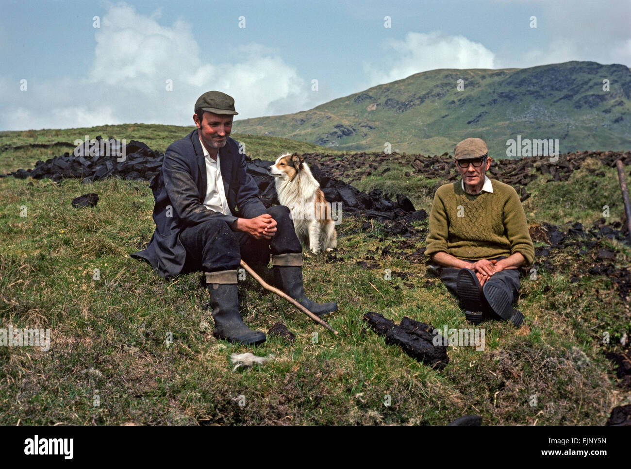 Blue Stack Mountains farmers resting after cutting peat, Donegal ...