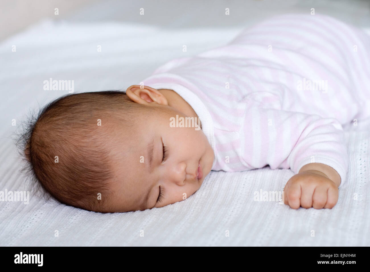 Baby sleeping stomach hi-res stock photography and images - Alamy