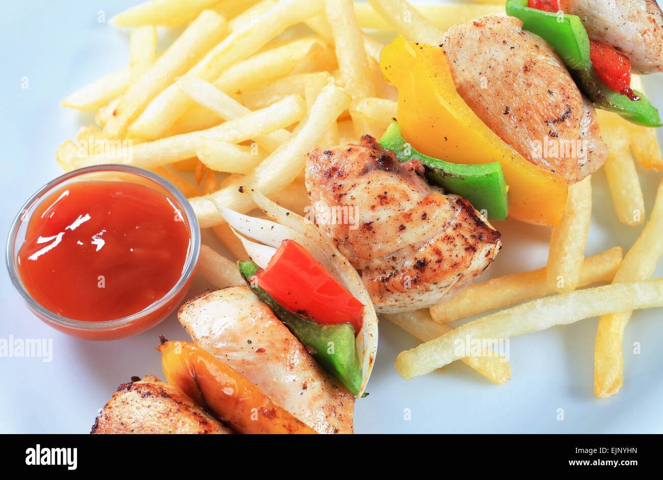Chicken kebab and chips hi-res stock photography and images - Alamy