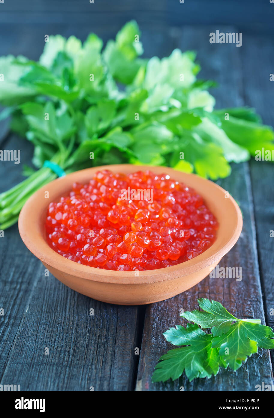 red salmon caviar in bowl and on a table Stock Photo - Alamy