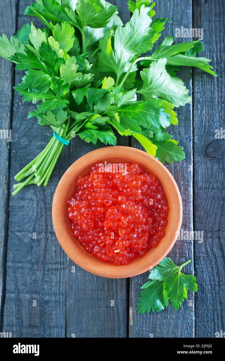 red salmon caviar in bowl and on a table Stock Photo - Alamy