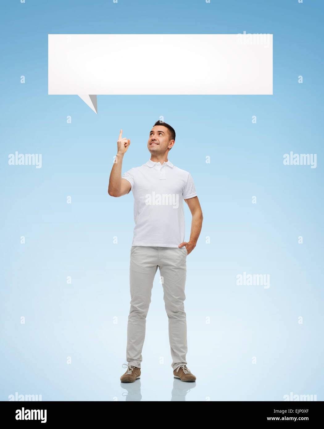 smiling man pointing finger up to text bubble Stock Photo - Alamy