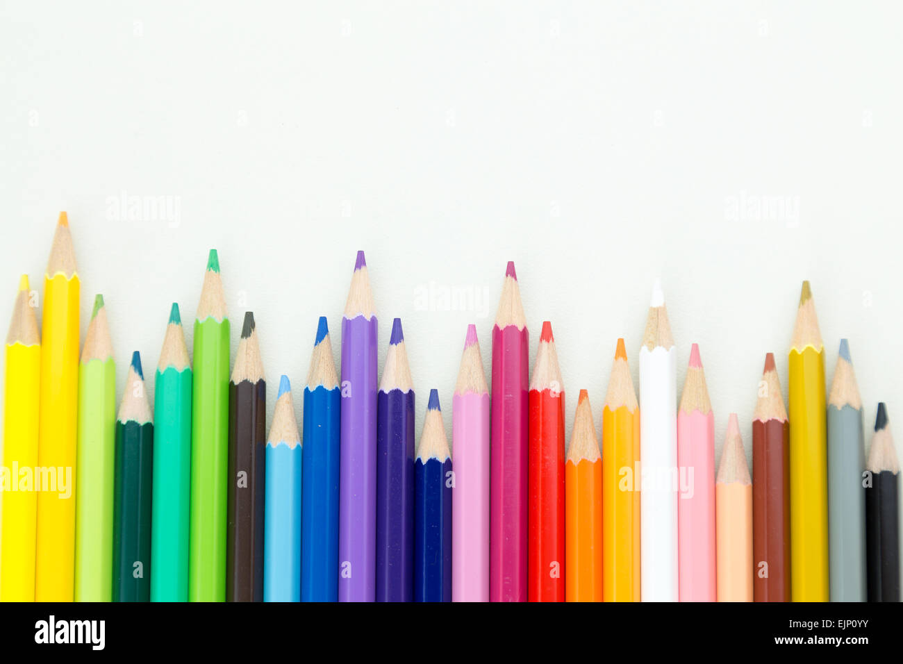 Colorful pencil crayons with copy space Stock Photo - Alamy