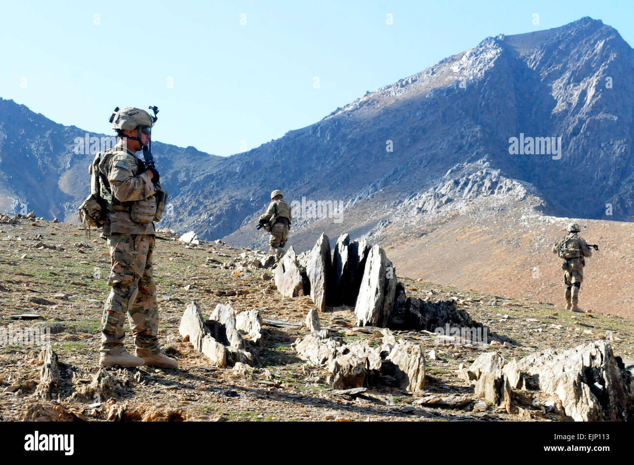 Soldiers with 1st Squadron, 13th Cavalry, stand guard while on patrol ...