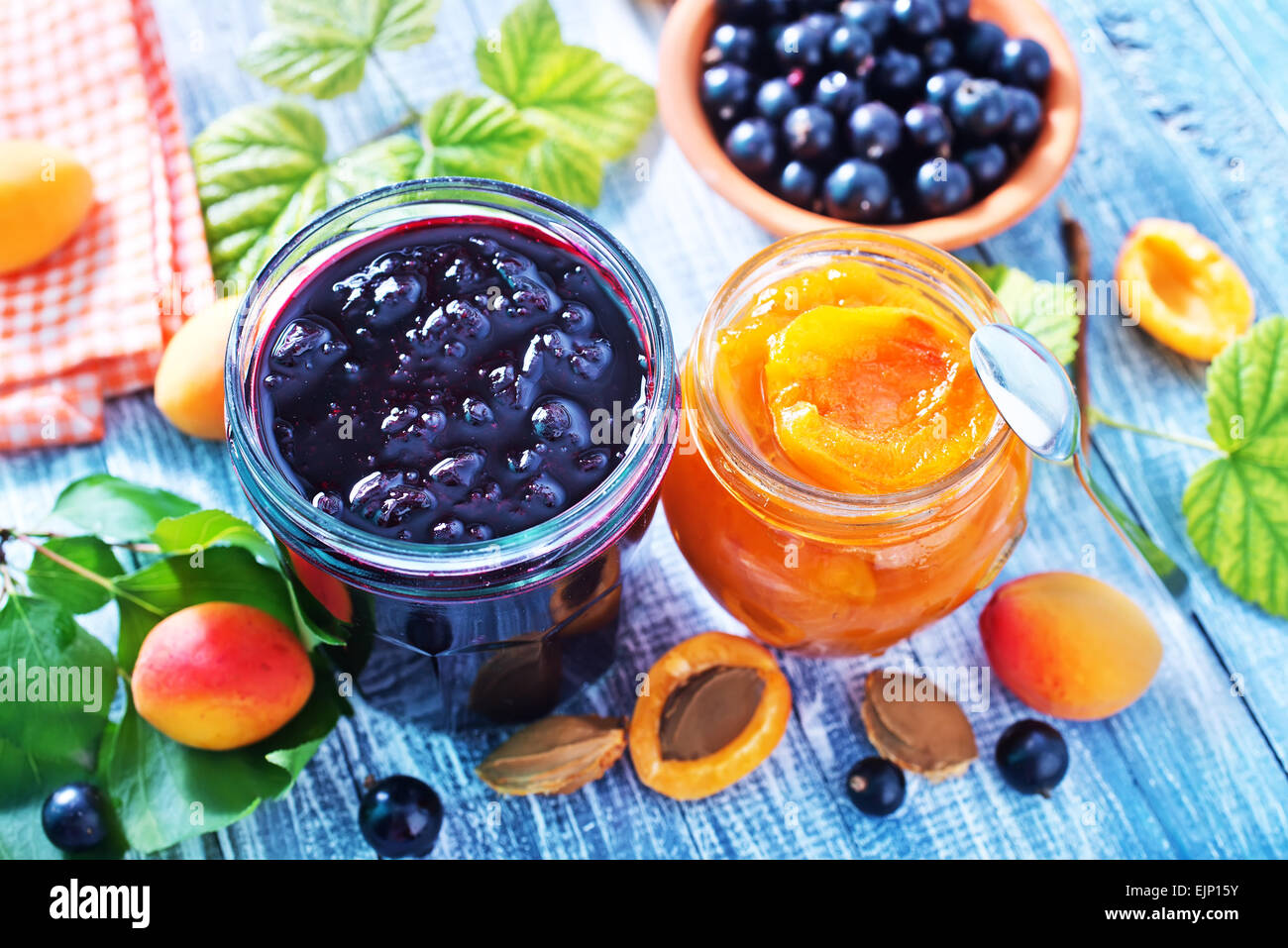 sweet jam in glass bank and on a table Stock Photo - Alamy
