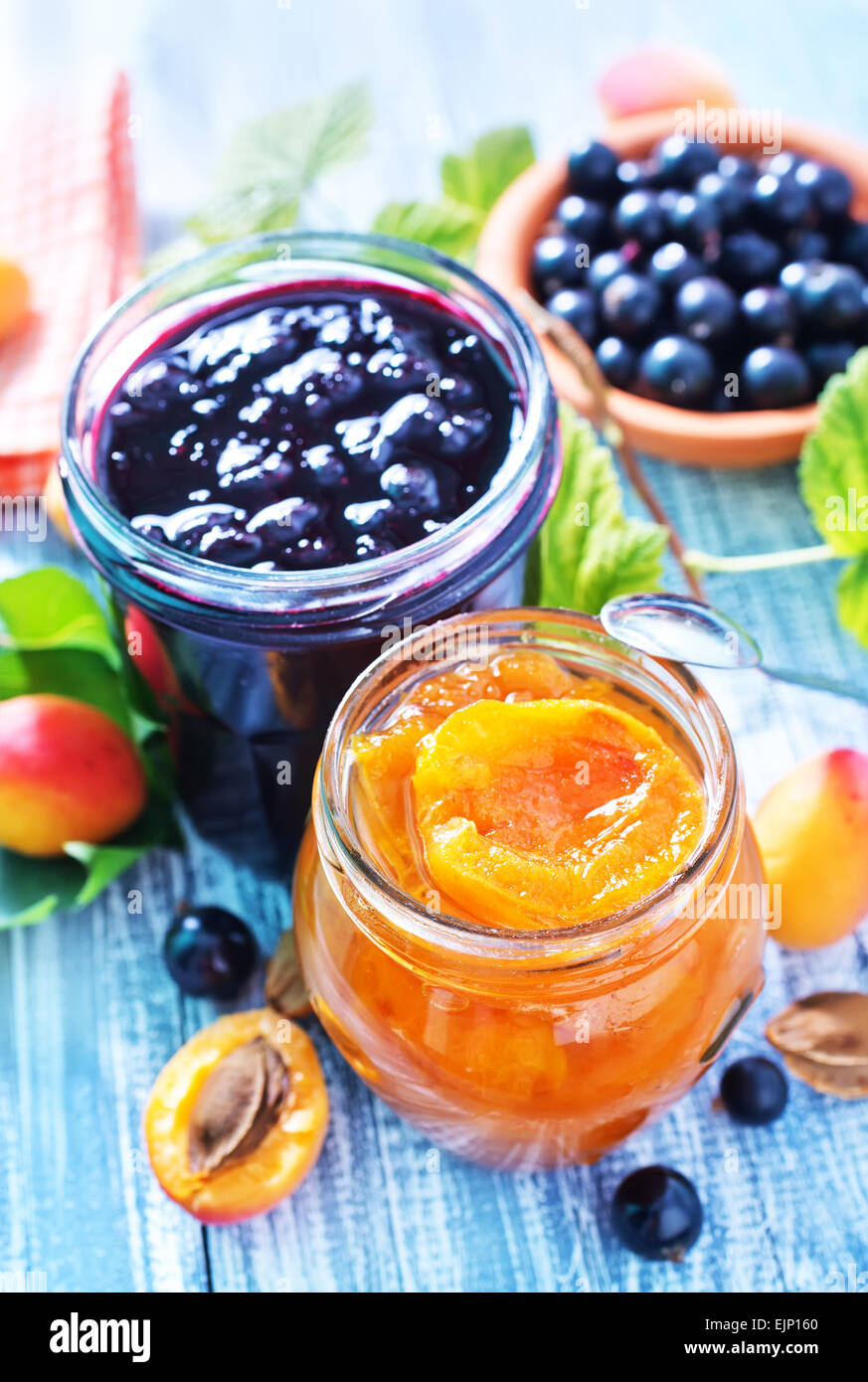 sweet jam in glass bank and on a table Stock Photo - Alamy