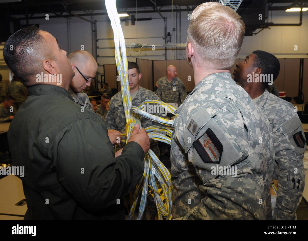 Jaycee Alcala left directs Soldiers from the 302nd Maneuver Enhancement ...