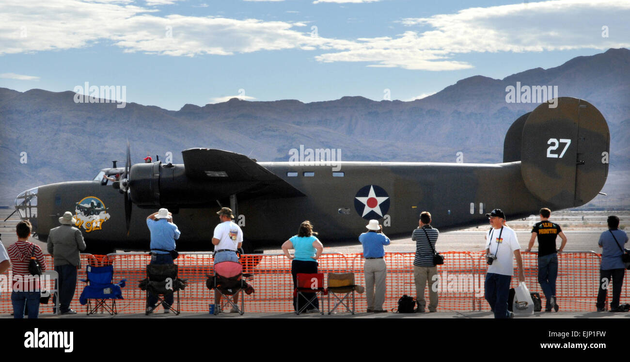 Spectators enjoy a close up view of a commemorative Air Force B-24 ...