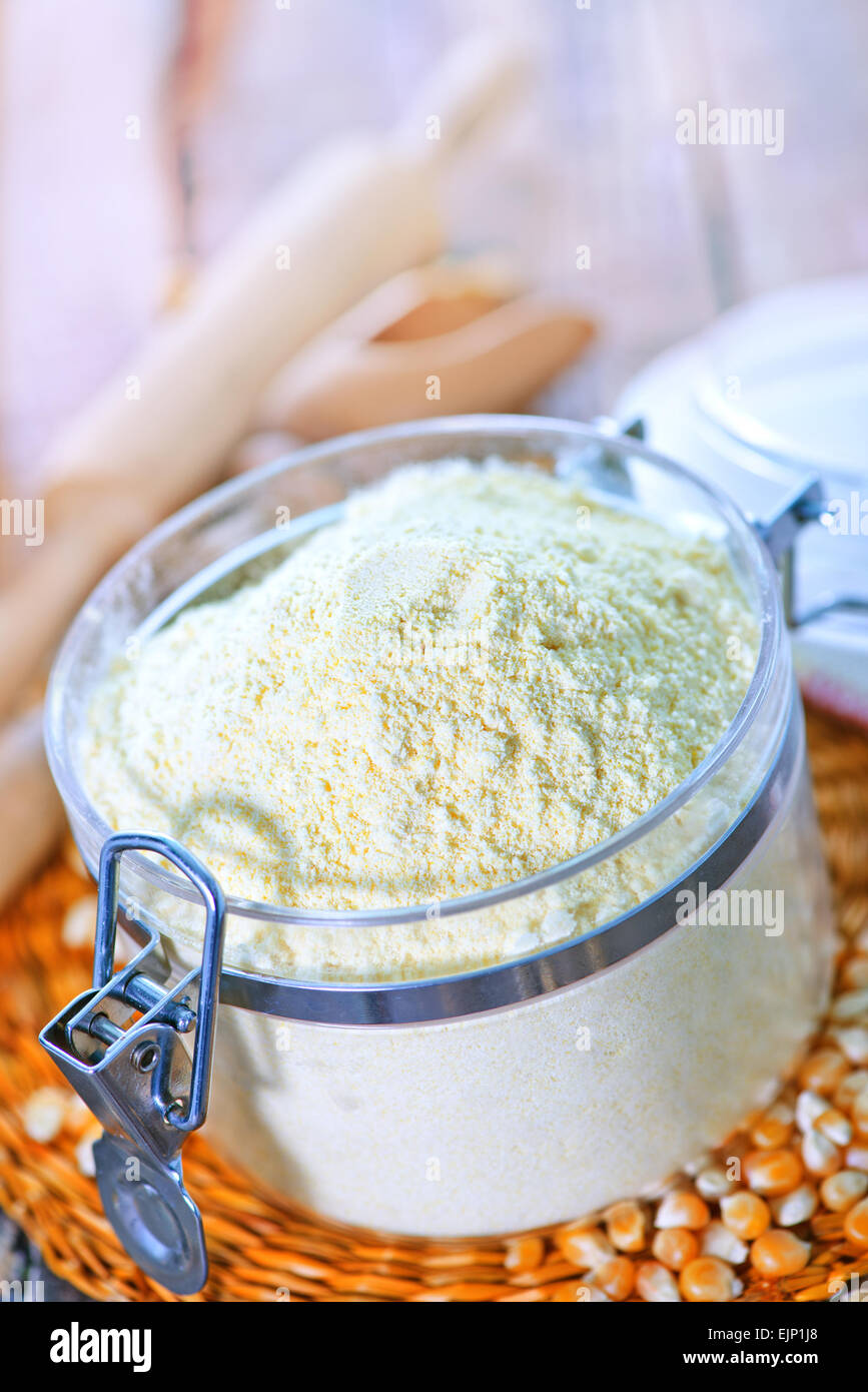 corn flour in glass bank and on a table Stock Photo - Alamy