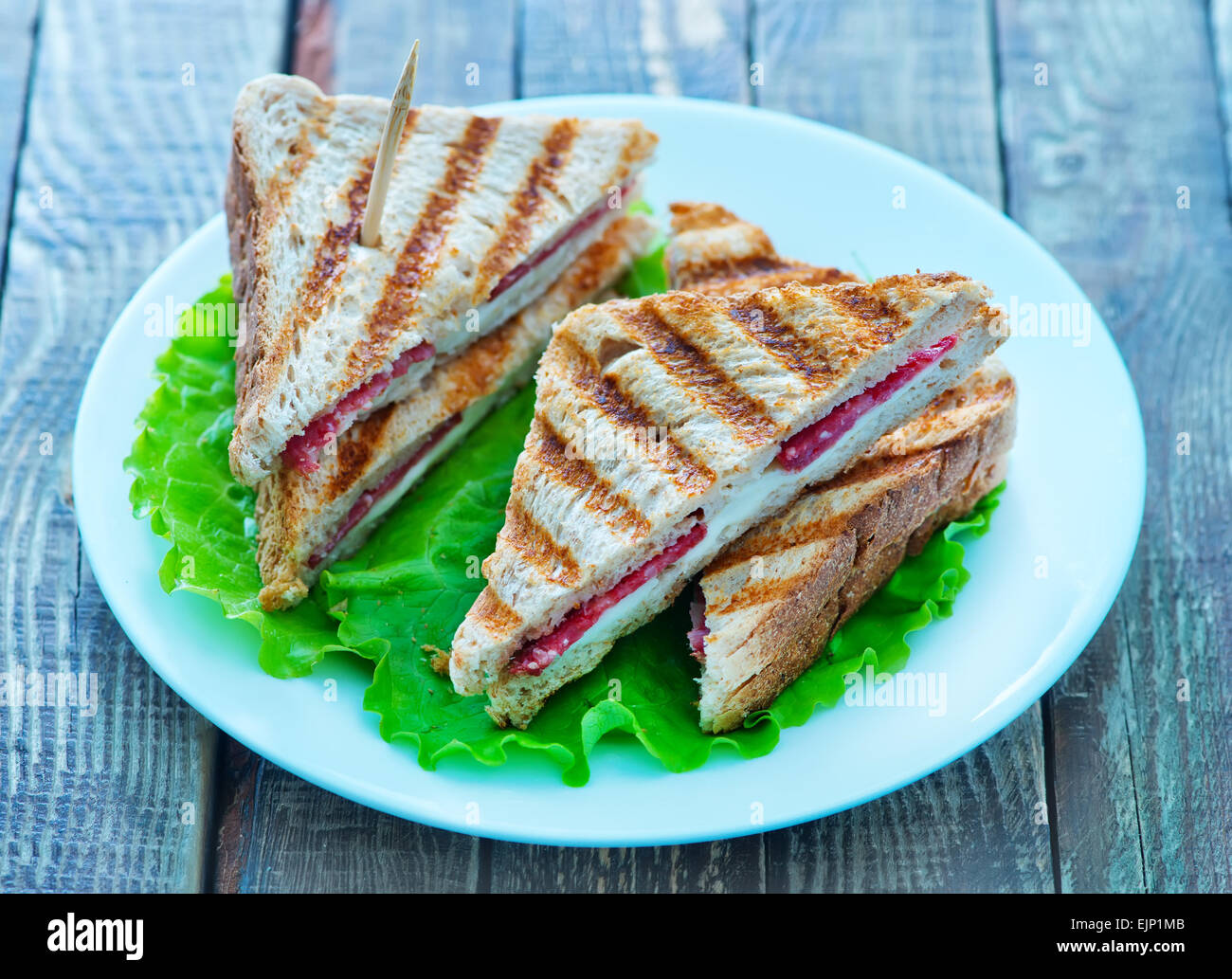 sandwiches on plate and on a table Stock Photo - Alamy