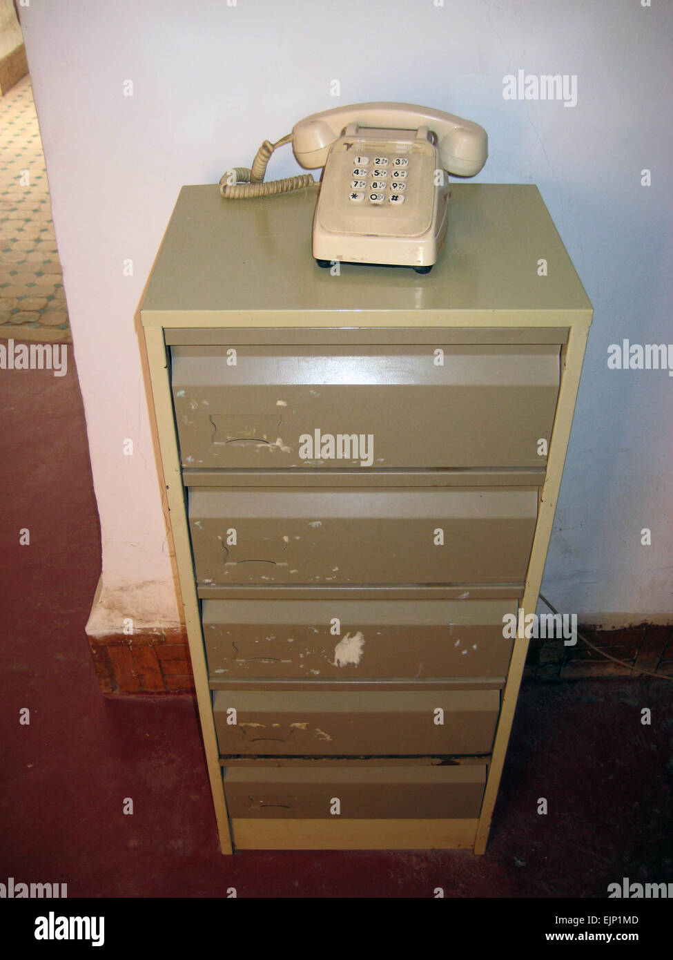 Phone on filing cabinet Stock Photo - Alamy