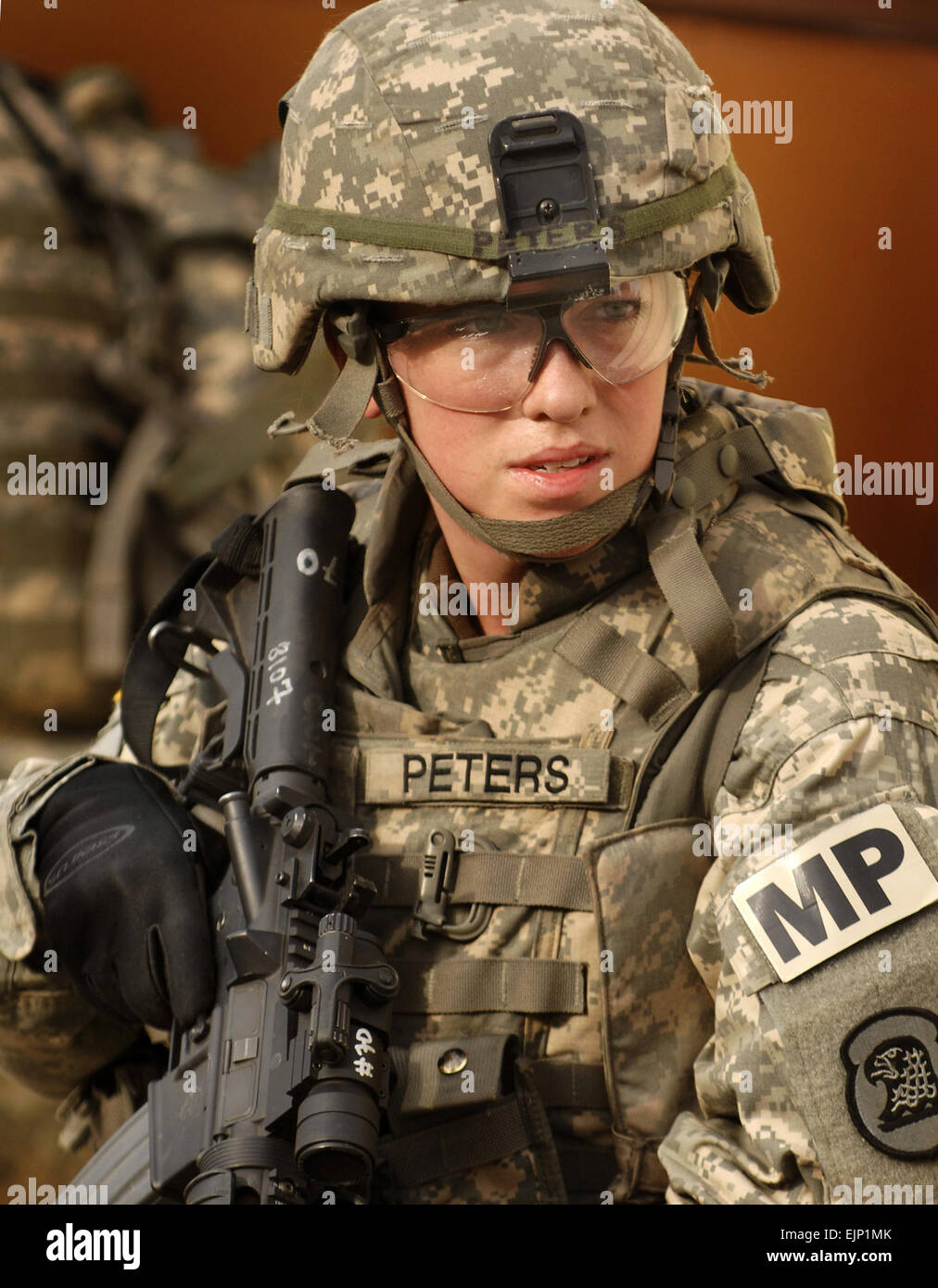 U.S. Army Sgt. Jennifer Peters, from the 186th Military Police Company ...