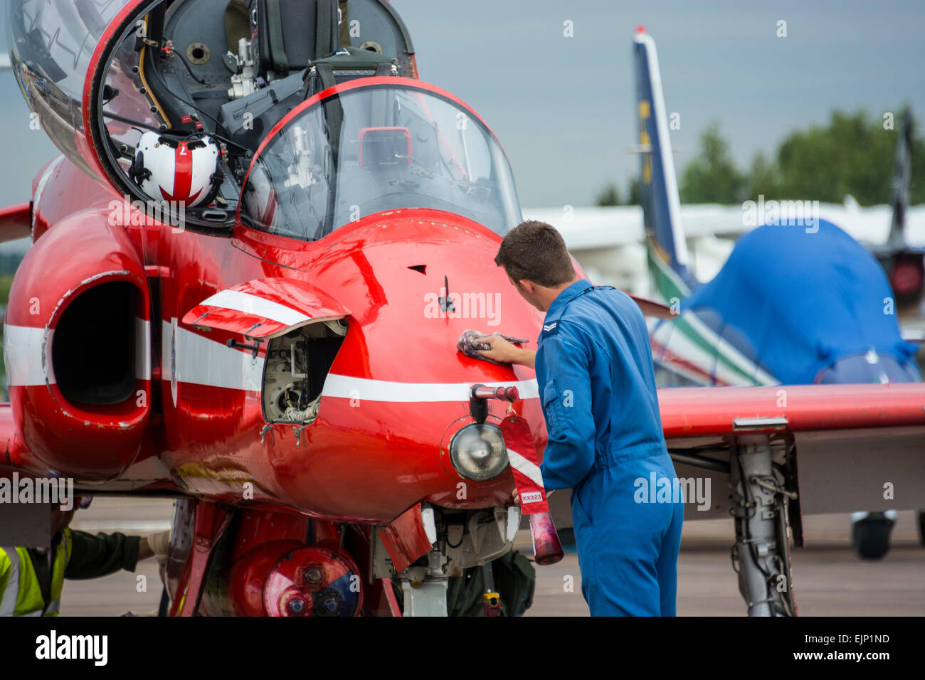 Red Arrows Hawk Aircraft being cleaned and prepared at RIAT 2014 by a ...