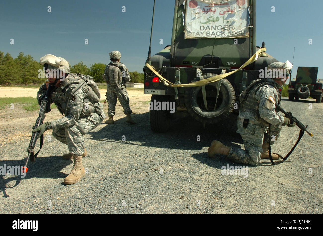 U.S. Army Maj. Ted Cusick, right, the brigade engineer for Headquarters ...