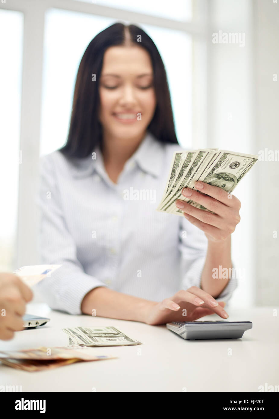 Happy counting money hi-res stock photography and images - Alamy