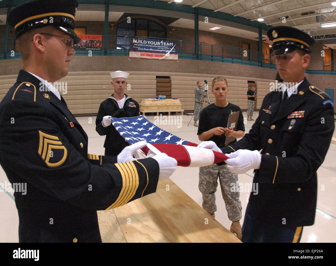 From left, Staff Sgt. Travis Hackey, North Dakota Army National Guard ...