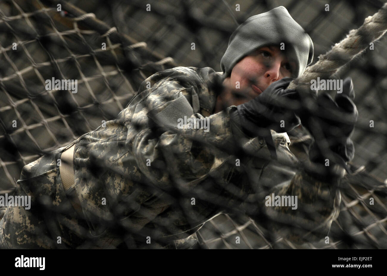 U.S. Army recruit completes an obstacle at Victory Tower during basic ...