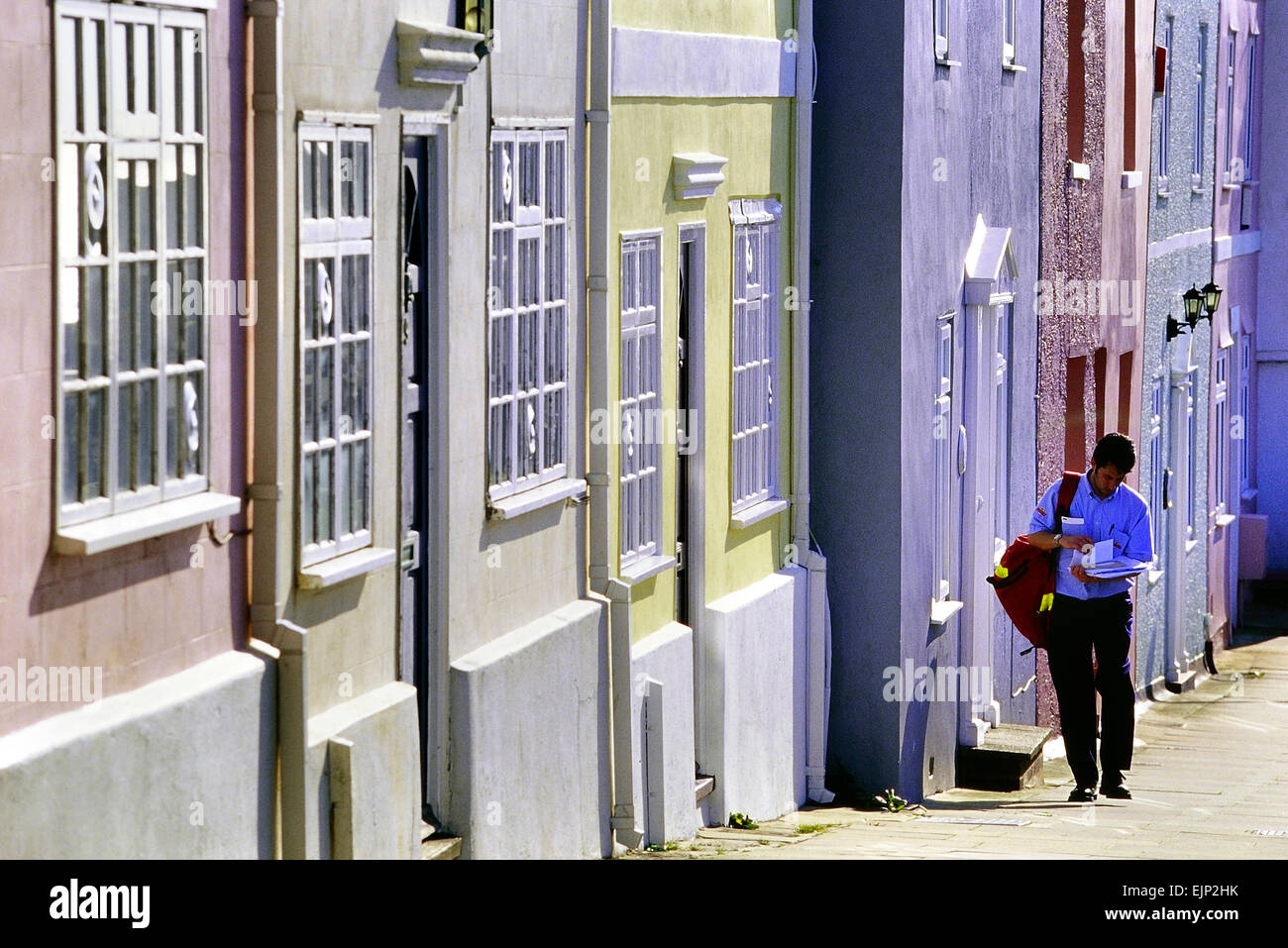 Male postman delivering mail. Hastings. East Sussex. England. UK Stock ...
