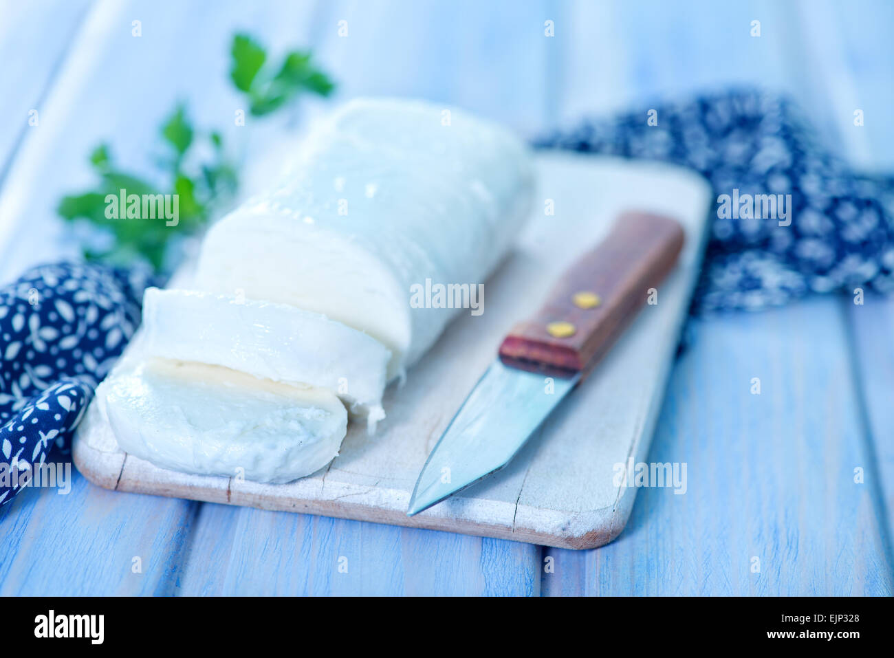 mozzarella on board and on a table Stock Photo - Alamy