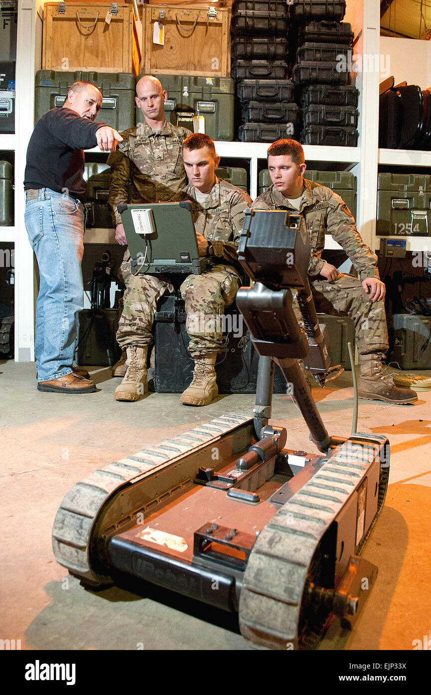 A civilian trainer explains how to setup the operating display for the ...