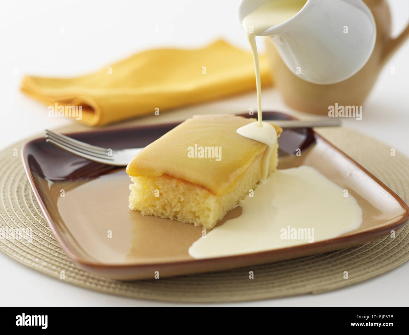 lemon curd pudding and cream Stock Photo - Alamy