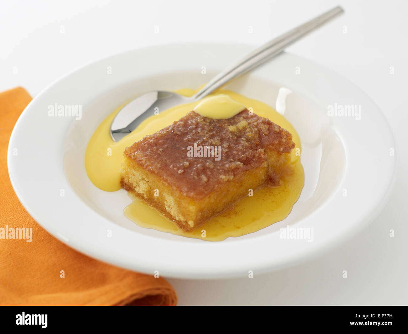 syrup sponge pudding with custard Stock Photo - Alamy
