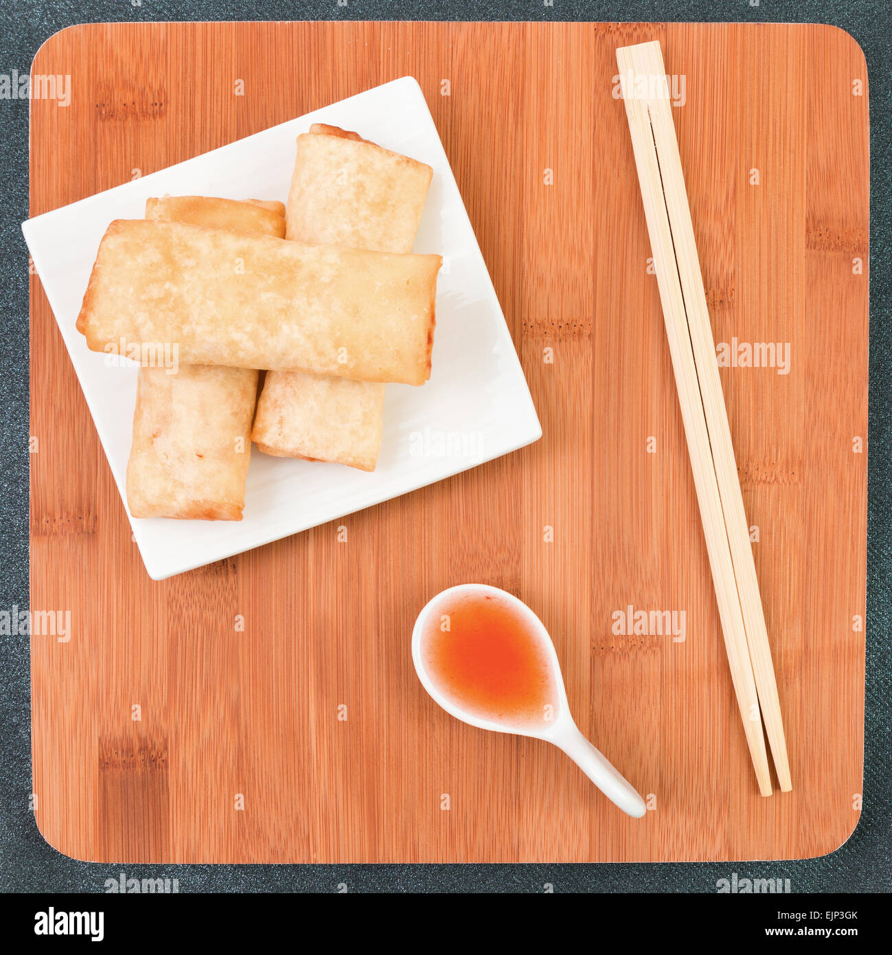 Spring rolls with chopsticks and sauce Stock Photo - Alamy