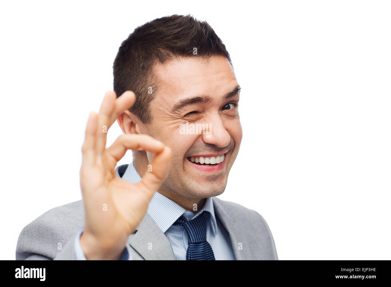 happy businessman in suit showing ok hand sign Stock Photo - Alamy