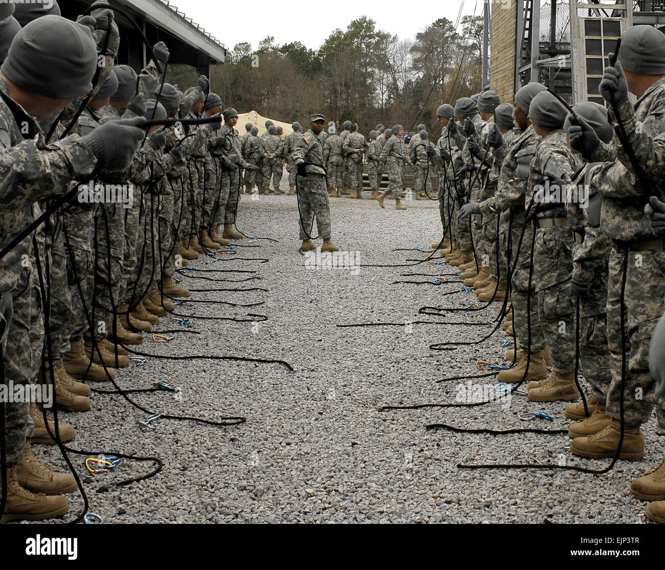 U.S. Army Staff Sgt. Derrick Manuel instructs new recruits on how to ...