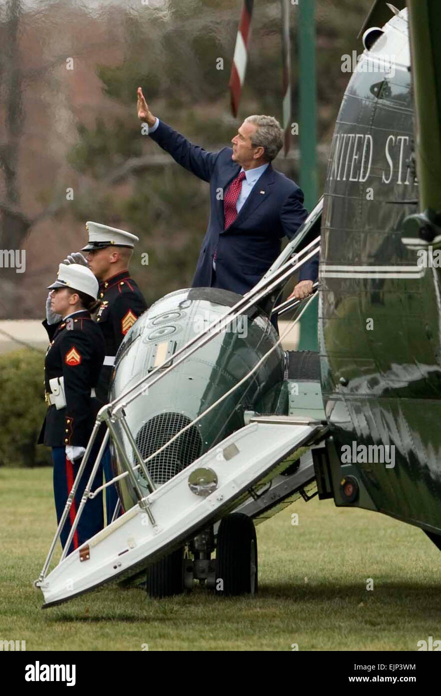 President George W. Bush waves goodbye as he boards Marine One ...