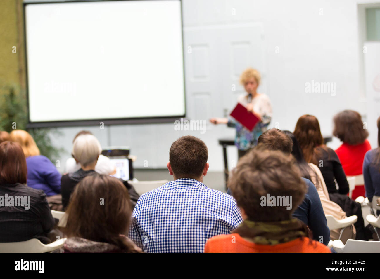 Woman lecturing at university Stock Photo - Alamy