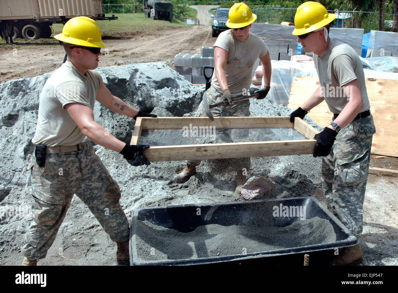 From left to right: U.S. Army Pfc. Abel Scott, Pfc. Wayne Paliwoda, and ...