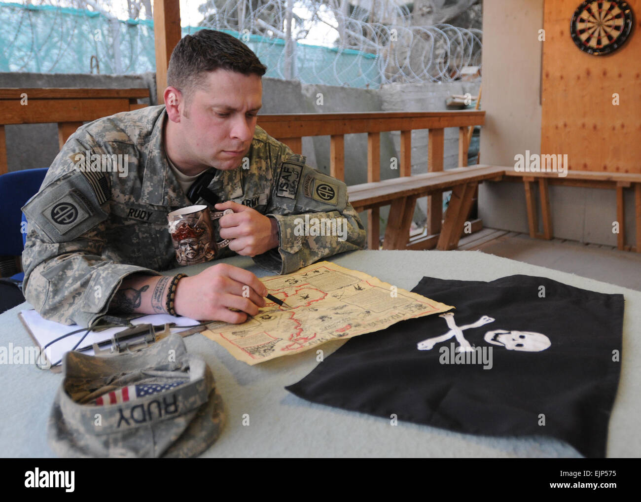 U.S. Army Sgt. Benjamin Rudy, a Columbia, S.C. native, looks at a map ...