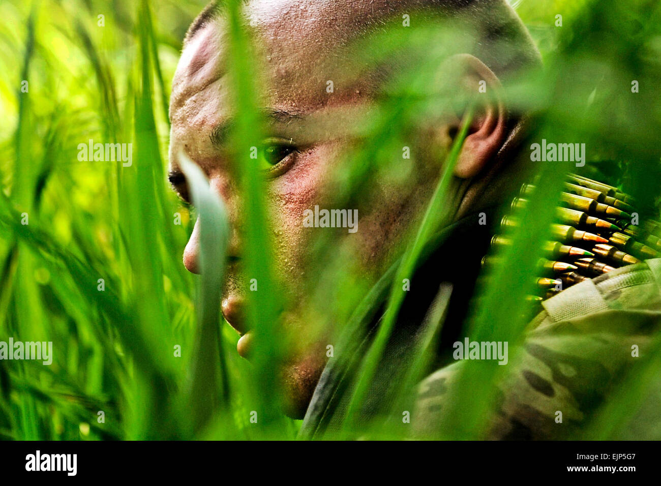 U.S. Army Spc. Adam Supino takes a break while on a security halt ...