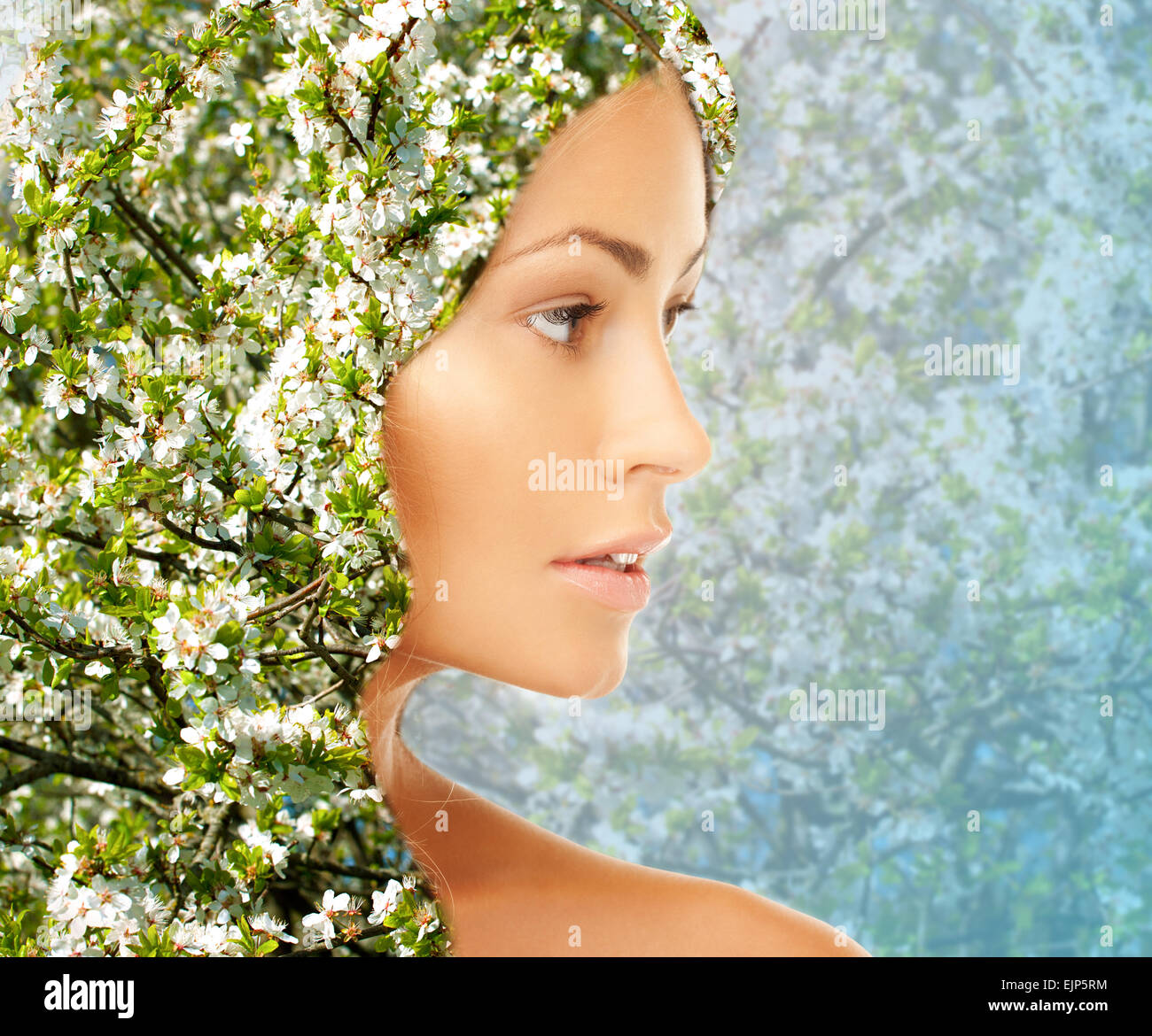 young woman face over blooming tree pattern Stock Photo - Alamy