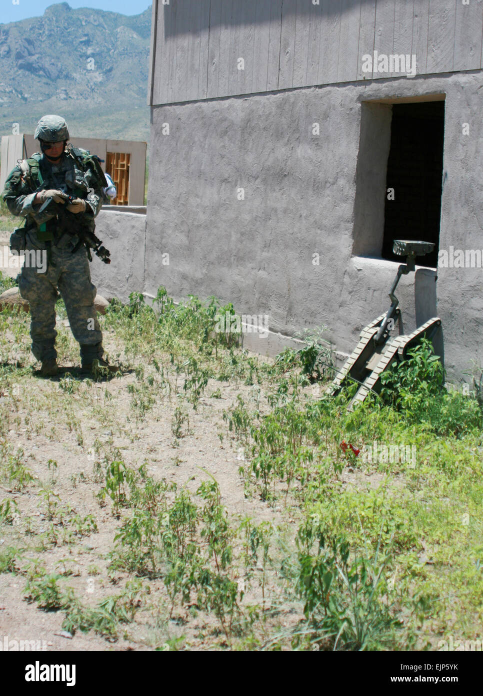 A Soldier uses the Small Unmanned Ground Vehicle SUGV for a ...