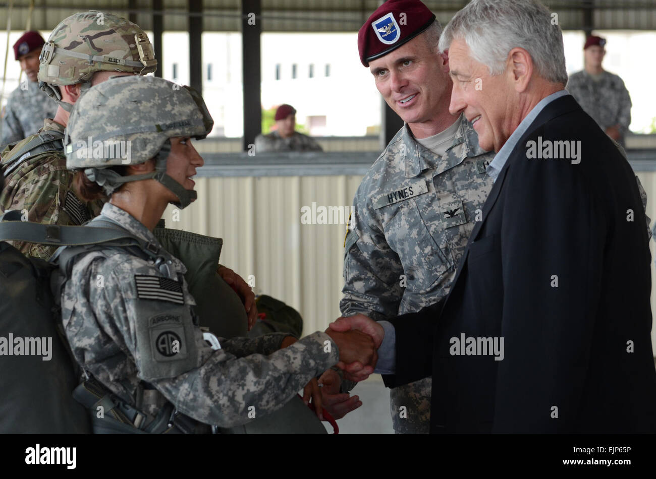 Secretary of Defense Chuck Hagel, and Col. Patrick Hynes, commander ...